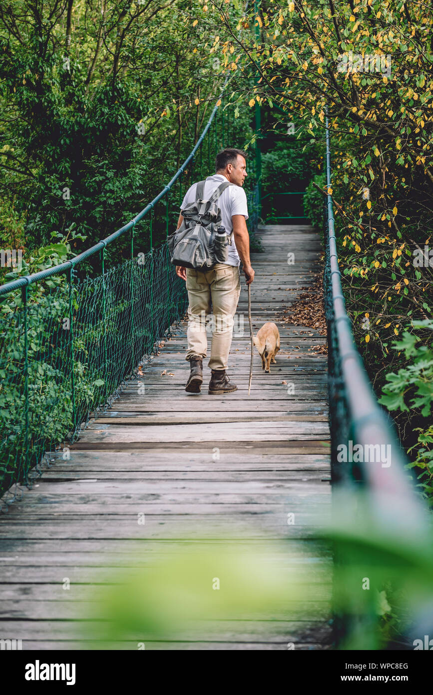Walking dog bridge hi-res stock photography and images - Alamy
