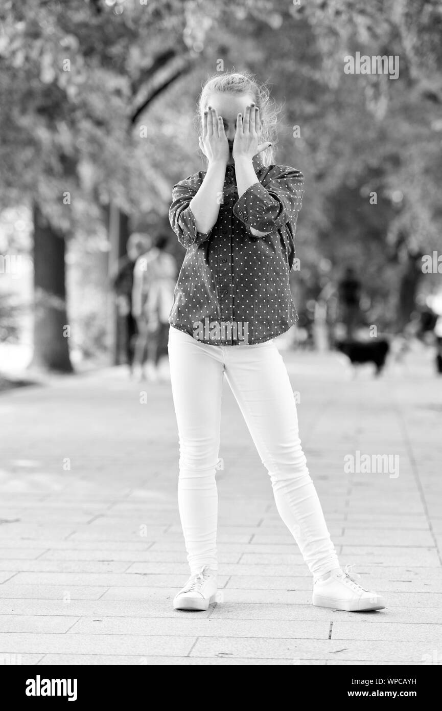 Hide and seek fun. Happy hiding game outdoors. Hide and seek urban ...