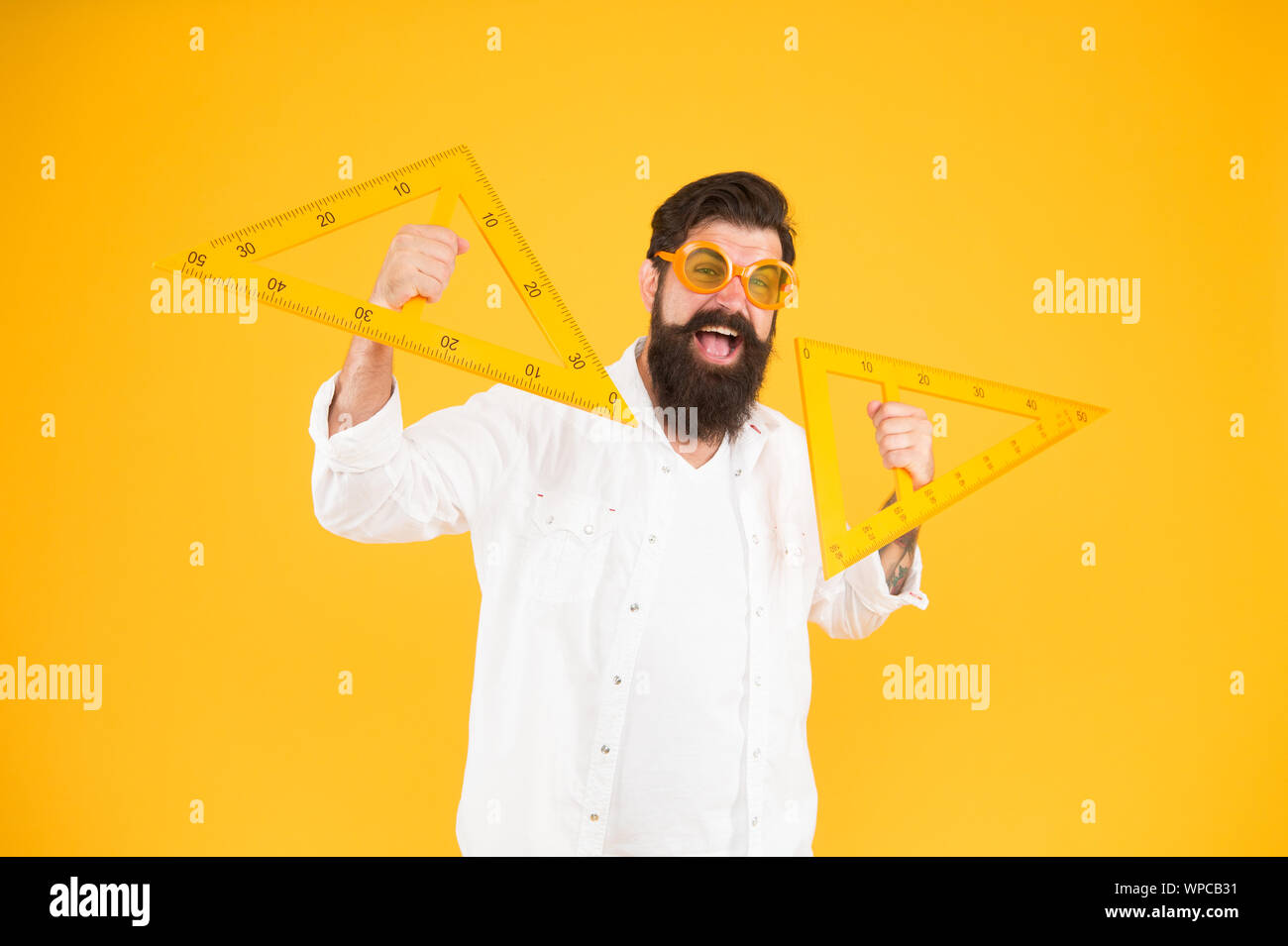 Engaged in structural engineering. Hipster teaching or learning ...