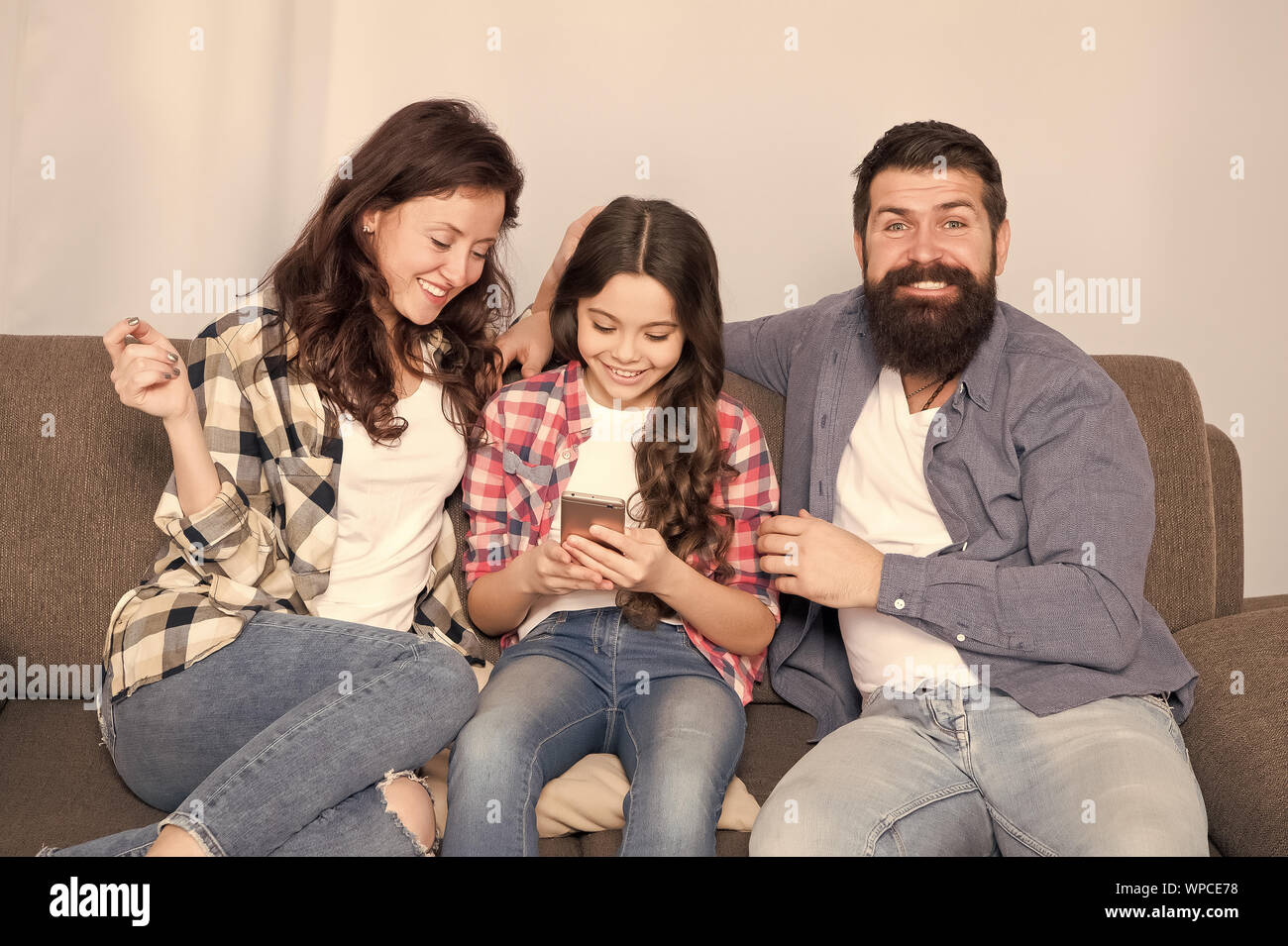 Parental advisory. Family spend weekend together. Child little girl use ...