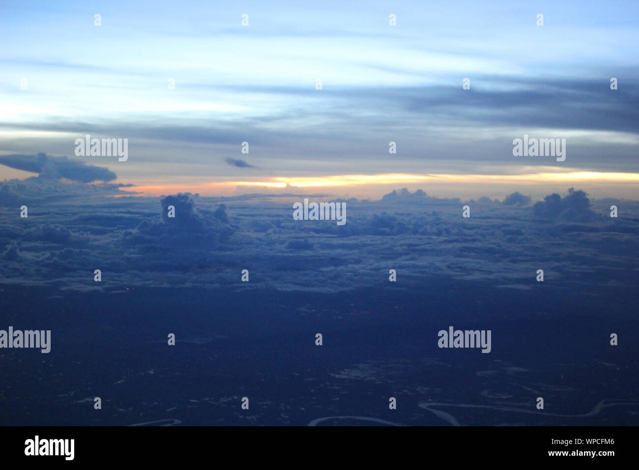 beautiful sunrise view from the window of an airplane Stock Photo - Alamy