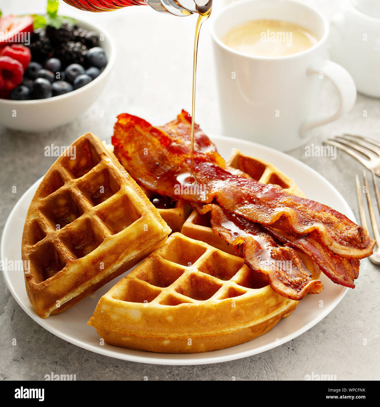 Breakfast plate with waffles and bacon Stock Photo - Alamy