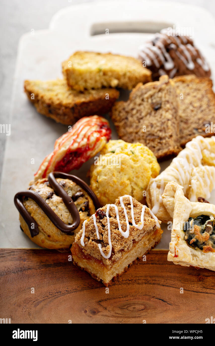 Variety of small pastries for breakfast Stock Photo - Alamy