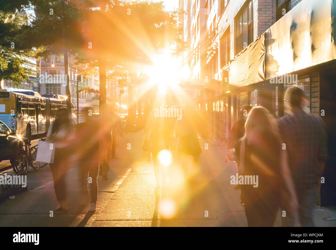 Groups of busy people walking down the crowded sidewalks of 14th Street ...