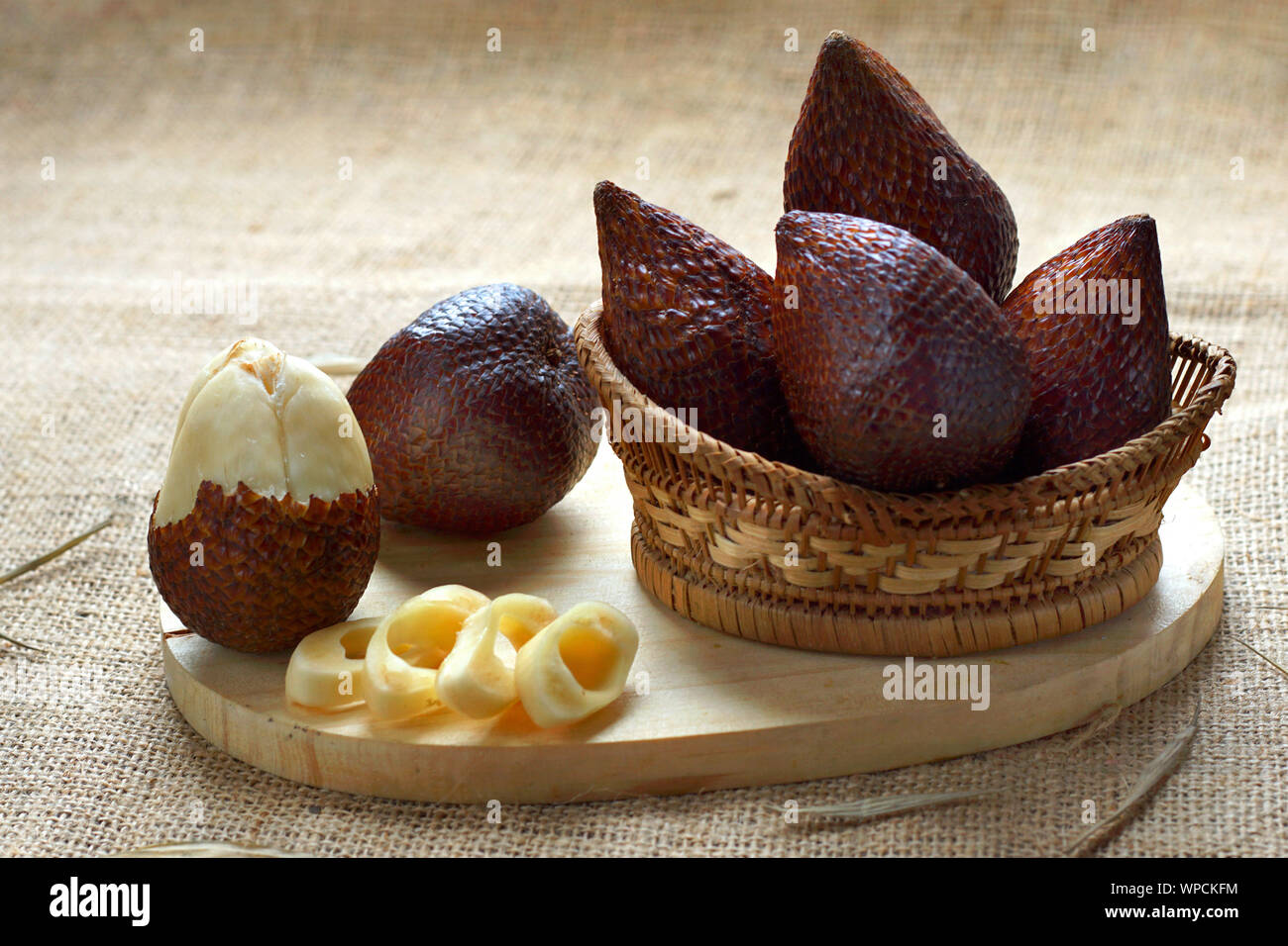 salak fruit or snake fruit native to java island on bamboo basket Stock ...