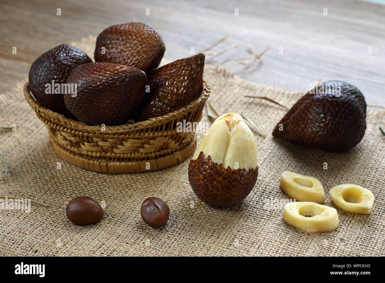 salak fruit or snake fruit native to java island on bamboo basket Stock ...