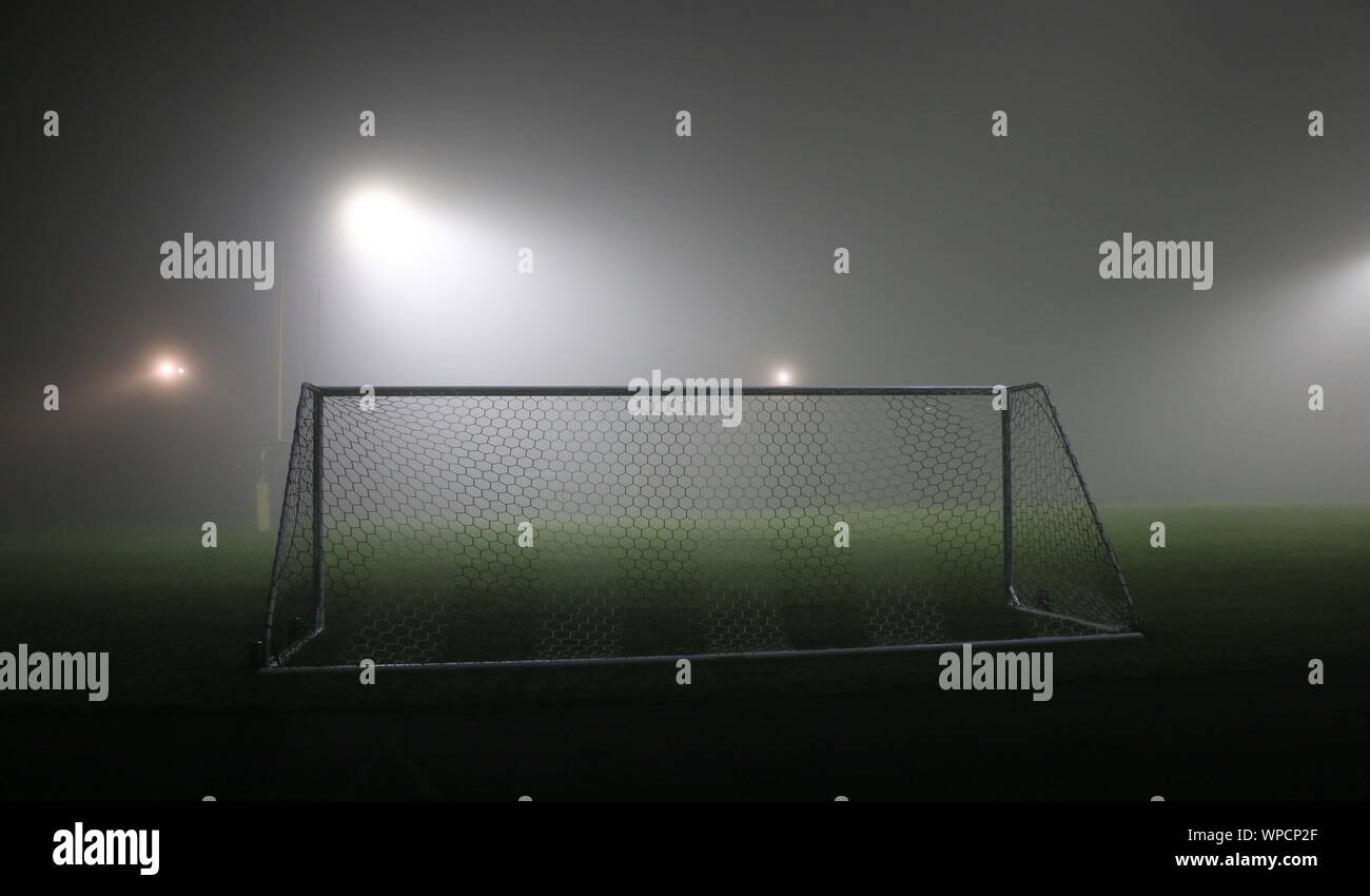 Goal posts stand alone on a foggy sports ground, northern California ...