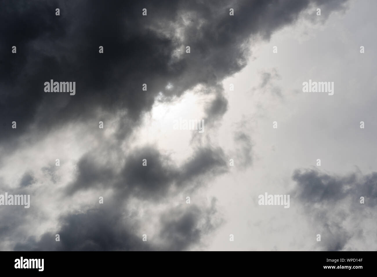 The sun shines in the dramatic sky Stock Photo - Alamy