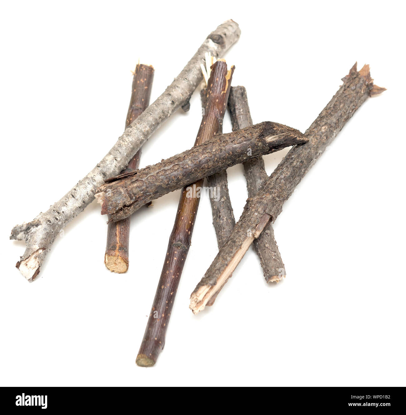 Pile of sticks isolated on white background Stock Photo - Alamy