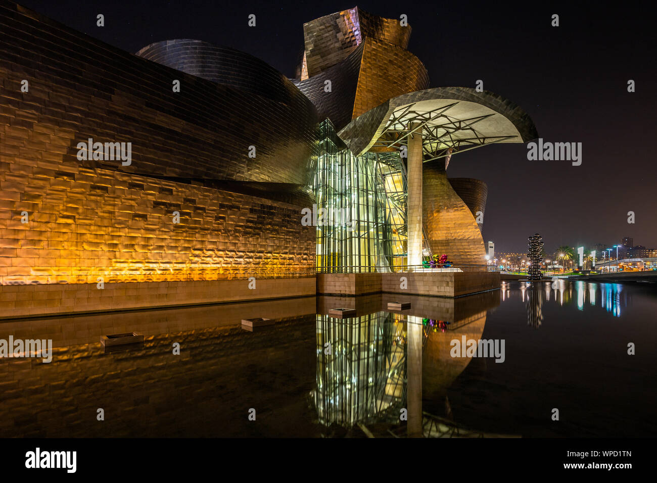 Scenic night view of Guggenheim Museum designed by Frank Gehry ...