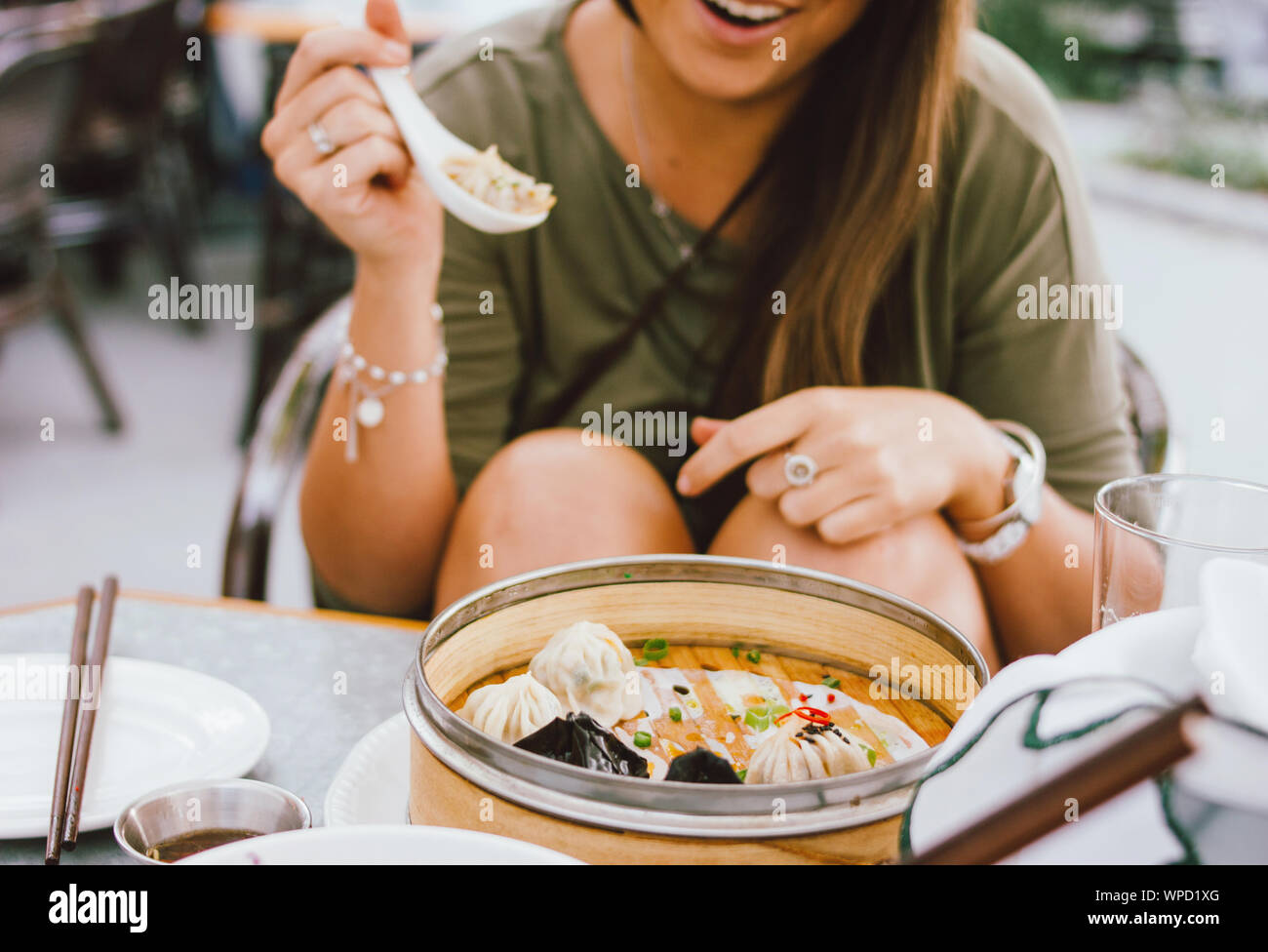 Woman Eating Dim Sum High Resolution Stock Photography and Images - Alamy