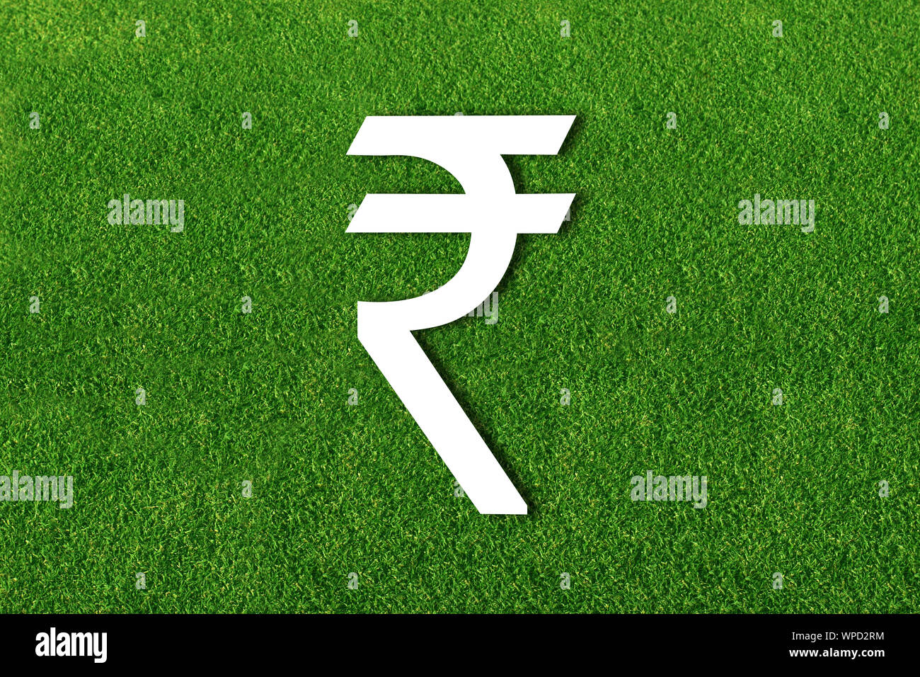 Indian rupee symbol on green grass Stock Photo - Alamy