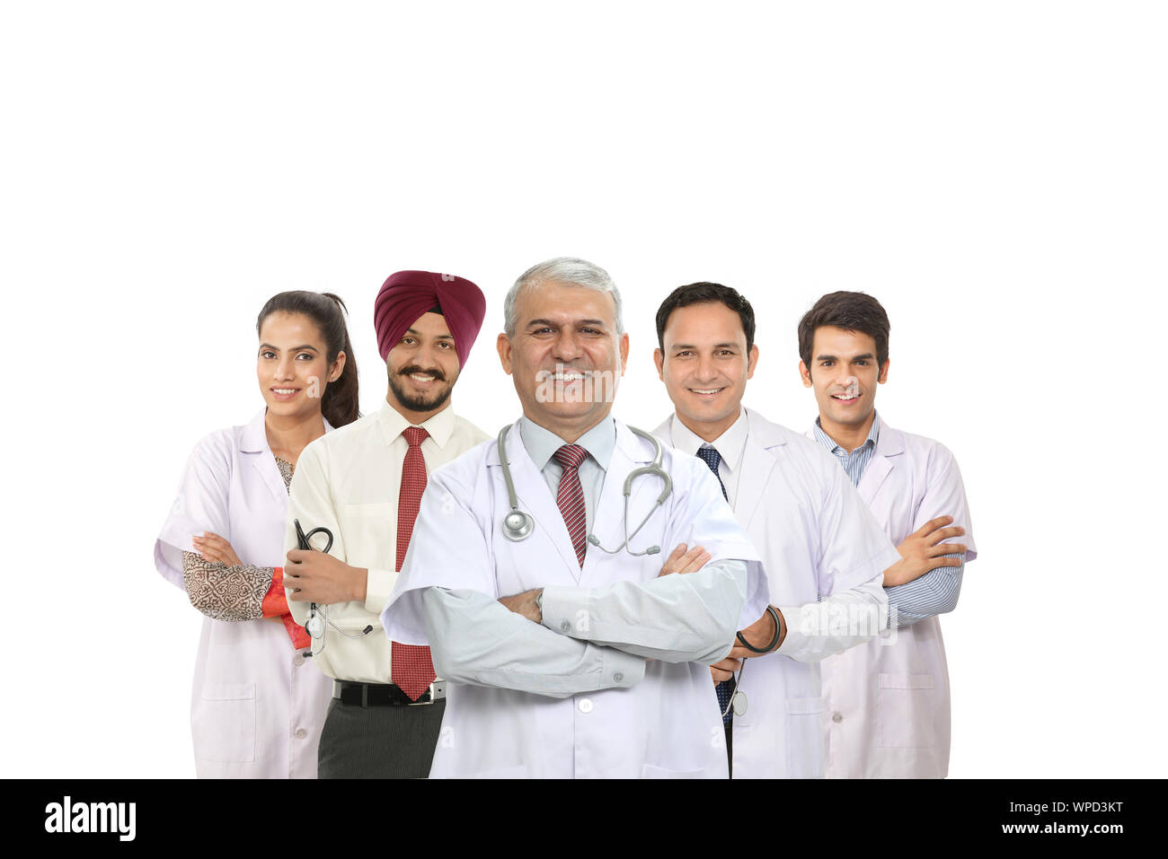 Portrait of confident group of doctors standing together Stock Photo ...