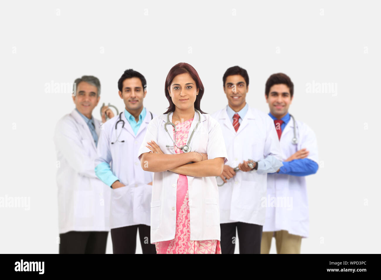 Confident group of doctors standing together Stock Photo - Alamy