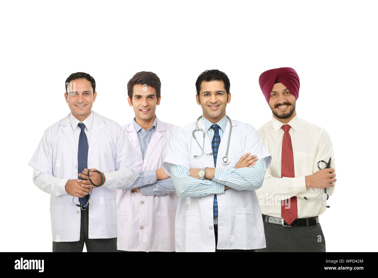Portrait of confident group of doctors standing together Stock Photo ...