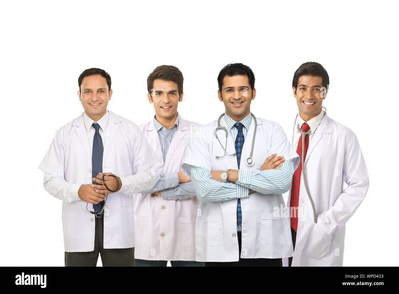 Portrait of confident group of doctors standing together Stock Photo ...
