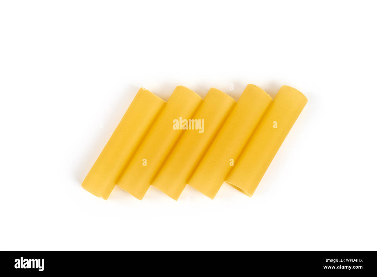 Italian cannelloni pasta tubes isolated over white background Stock ...