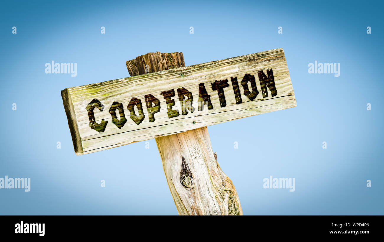 Street Sign the Direction Way to Cooperation Stock Photo - Alamy