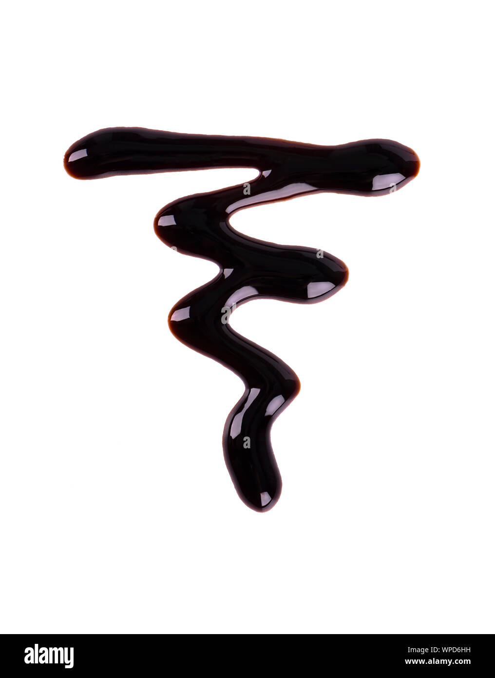 Chocolate syrup drop isolated on white background. Top view Stock Photo ...