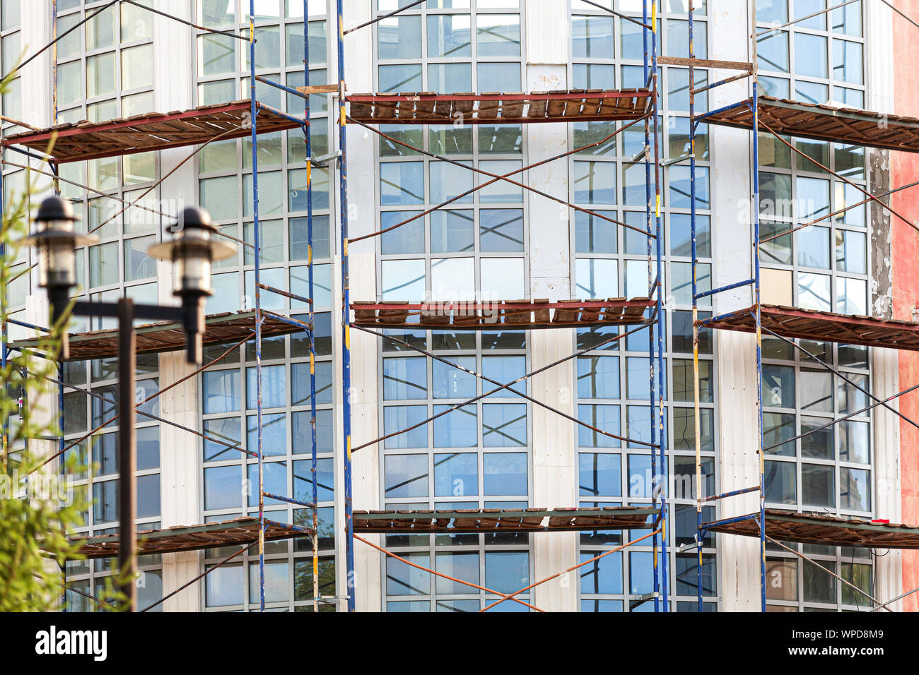 Scaffolding on the facade of a building under construction Stock Photo ...