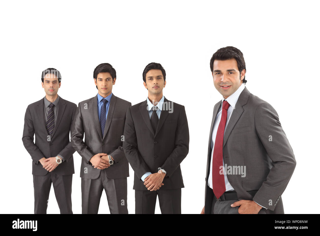 Businessman leading his team Stock Photo - Alamy