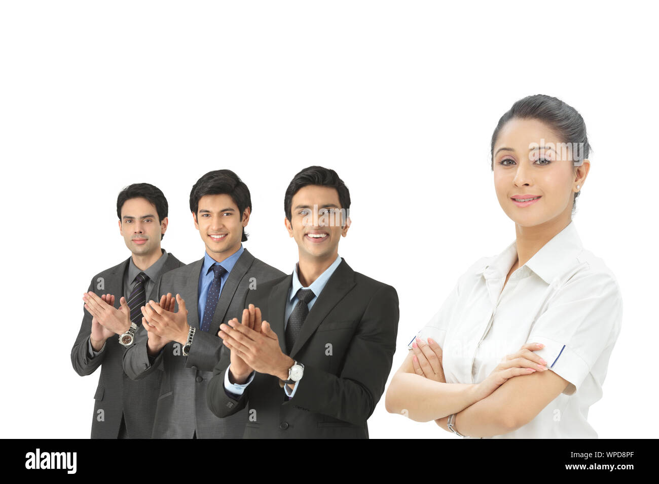 Business executives clapping with her colleague Stock Photo - Alamy