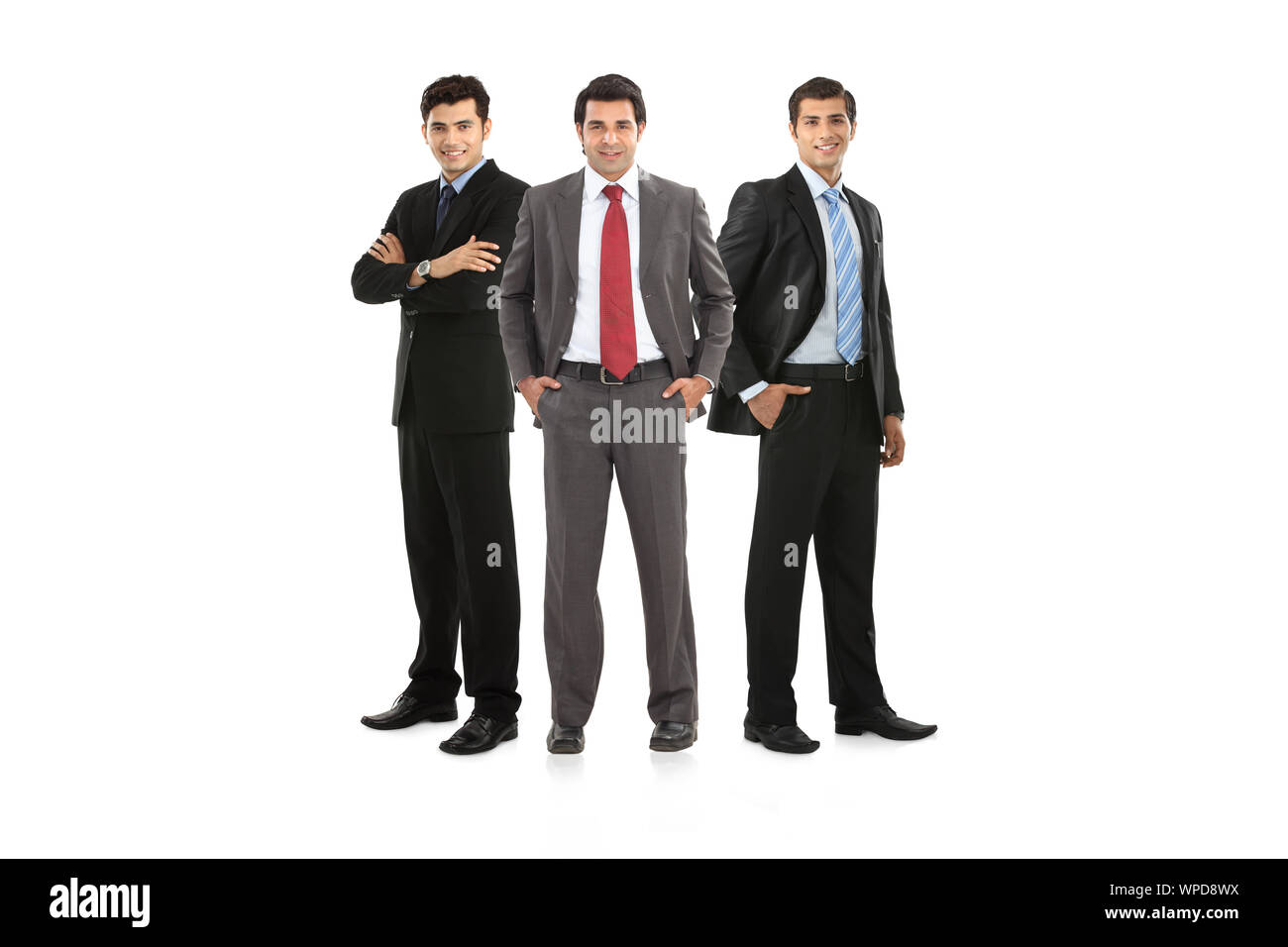 Group of business executives standing together Stock Photo - Alamy