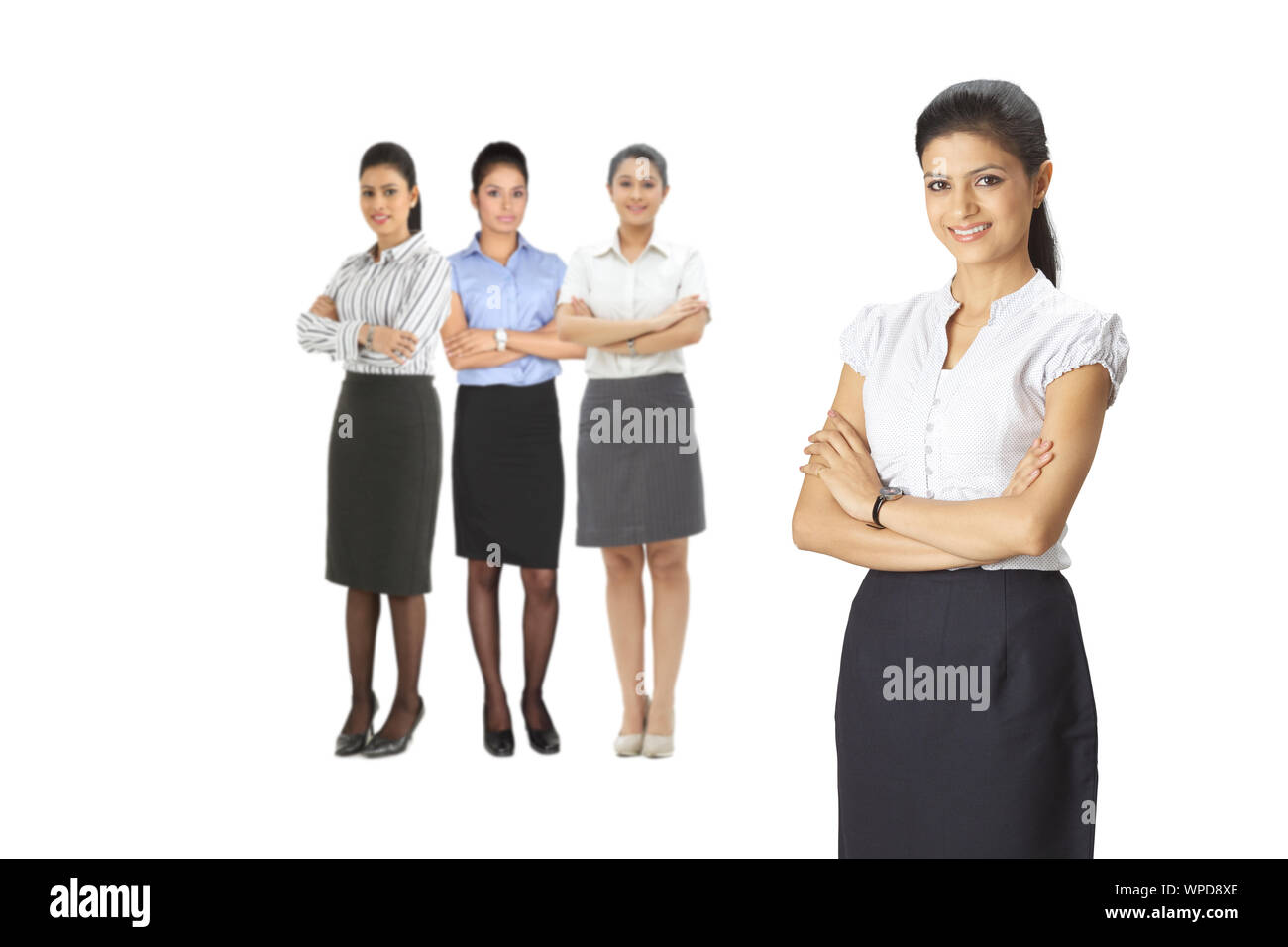 Businesswoman leading her team Stock Photo - Alamy