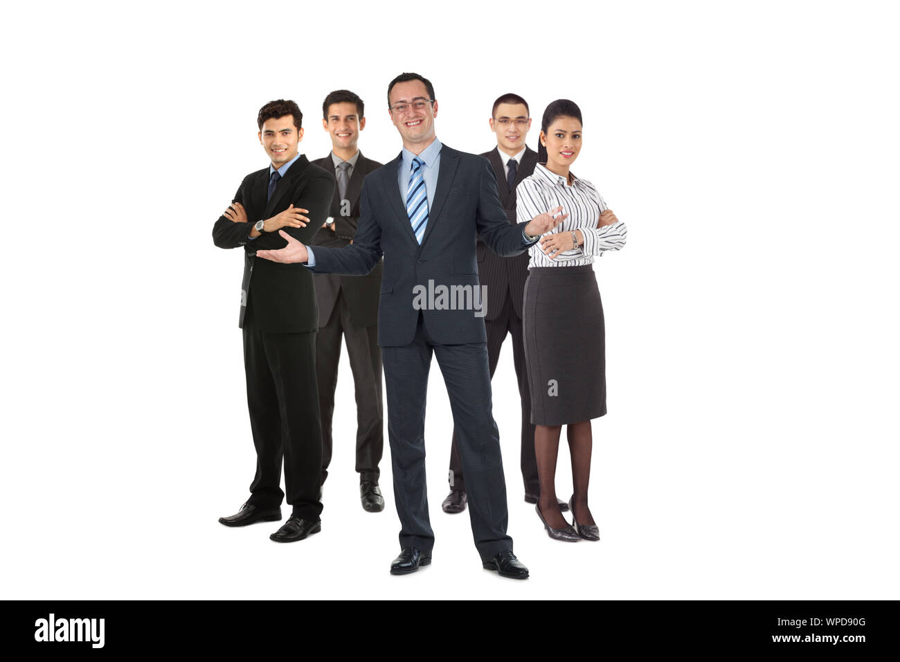 Businessman standing and showing his team Stock Photo - Alamy