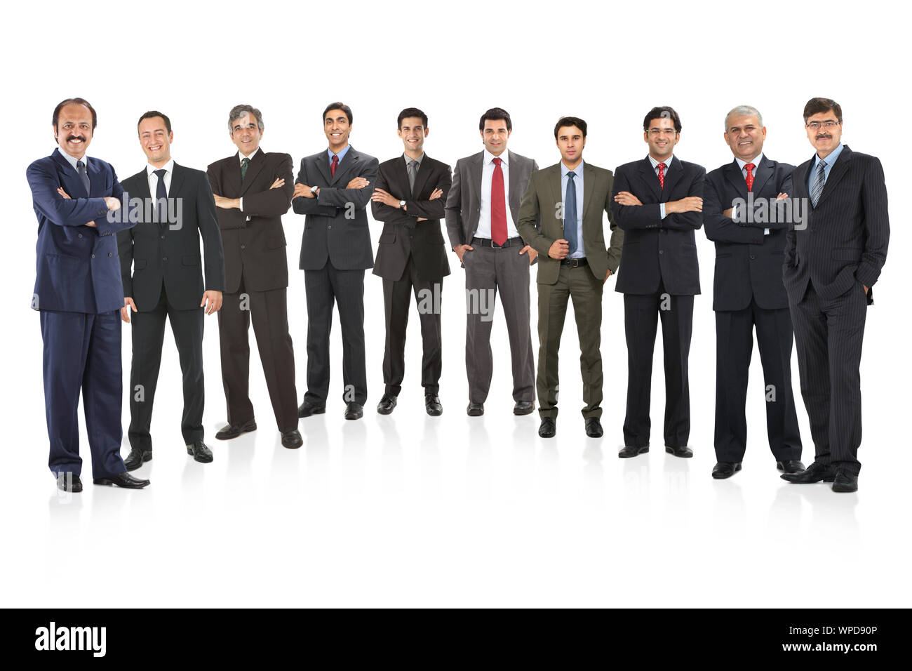 Group of business executives standing together Stock Photo - Alamy