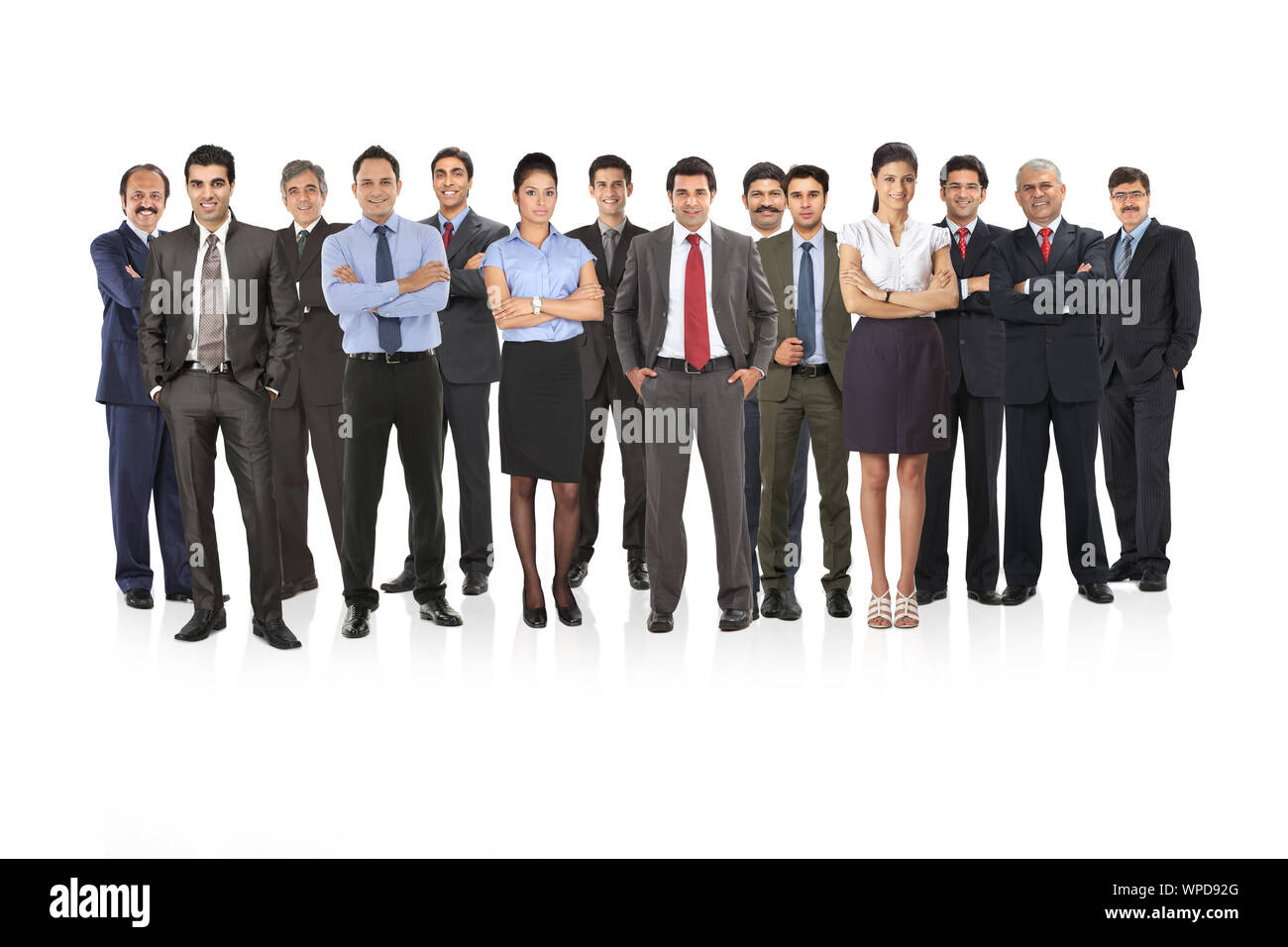 Group of business executives standing together Stock Photo - Alamy