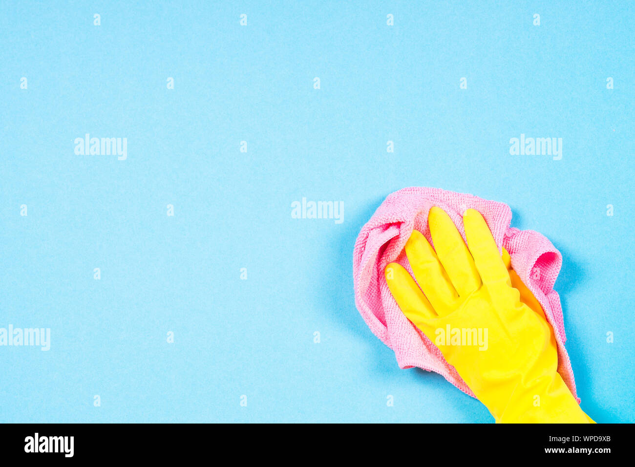 Blue and yellow gloves hi-res stock photography and images - Alamy