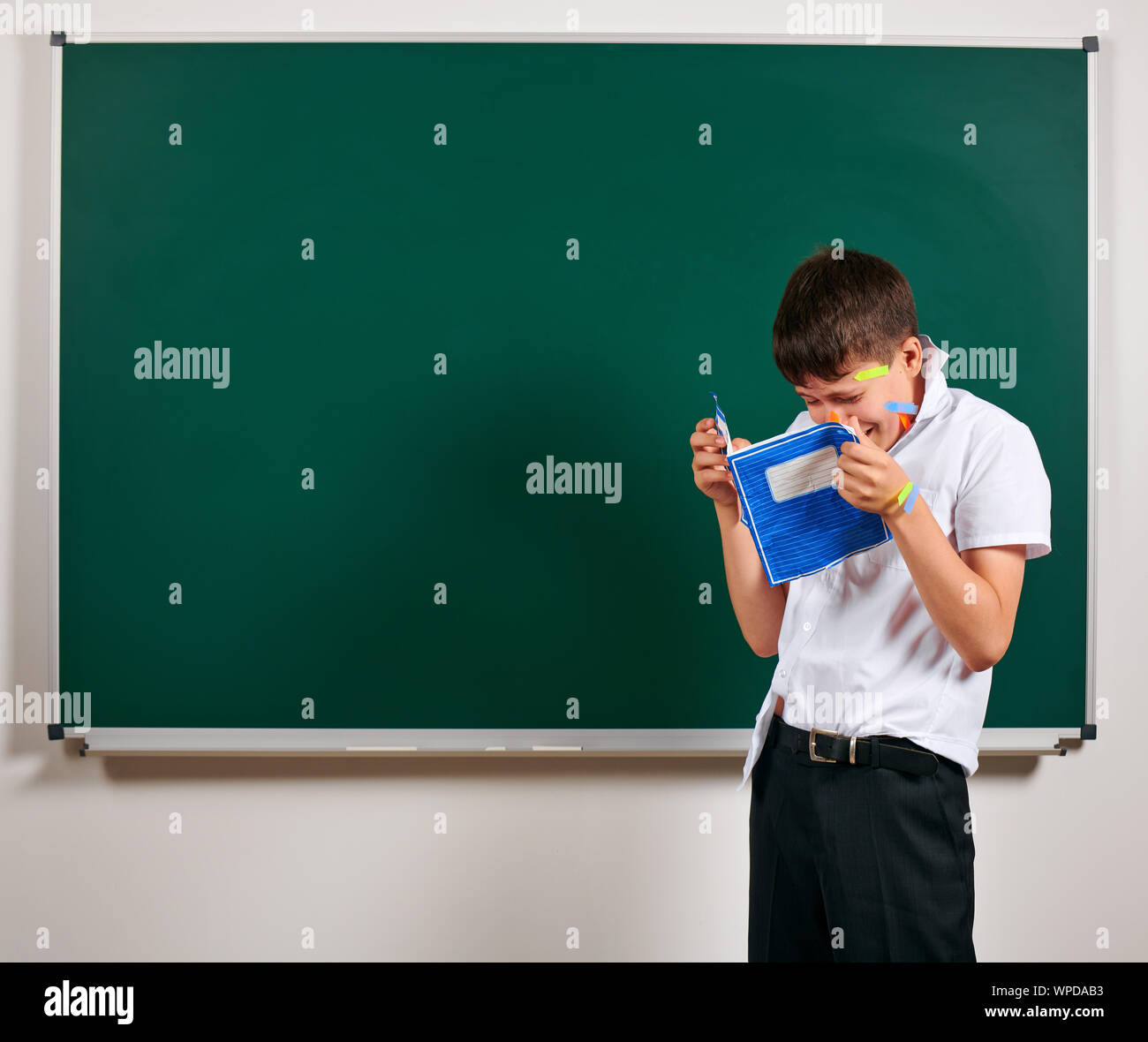 Portrait of funny pupil. School boy very emotional, having fun and very ...