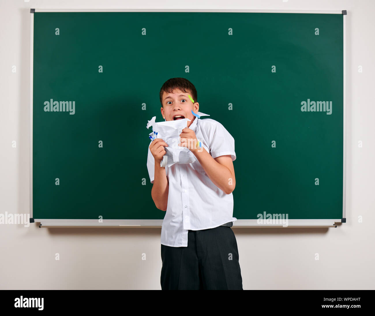 Portrait of funny pupil. School boy very emotional, having fun and very ...