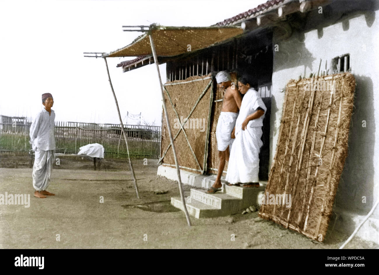 Mahatma Gandhi with Amtus Salam leaving his hut, Wardha, Maharashtra ...