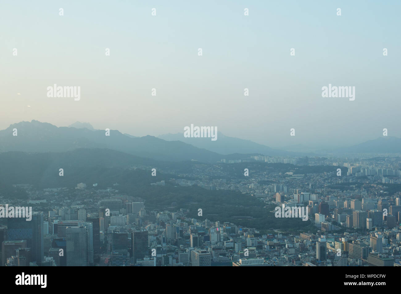Seoul city street view from top in summer in Korea toned in blue-green ...