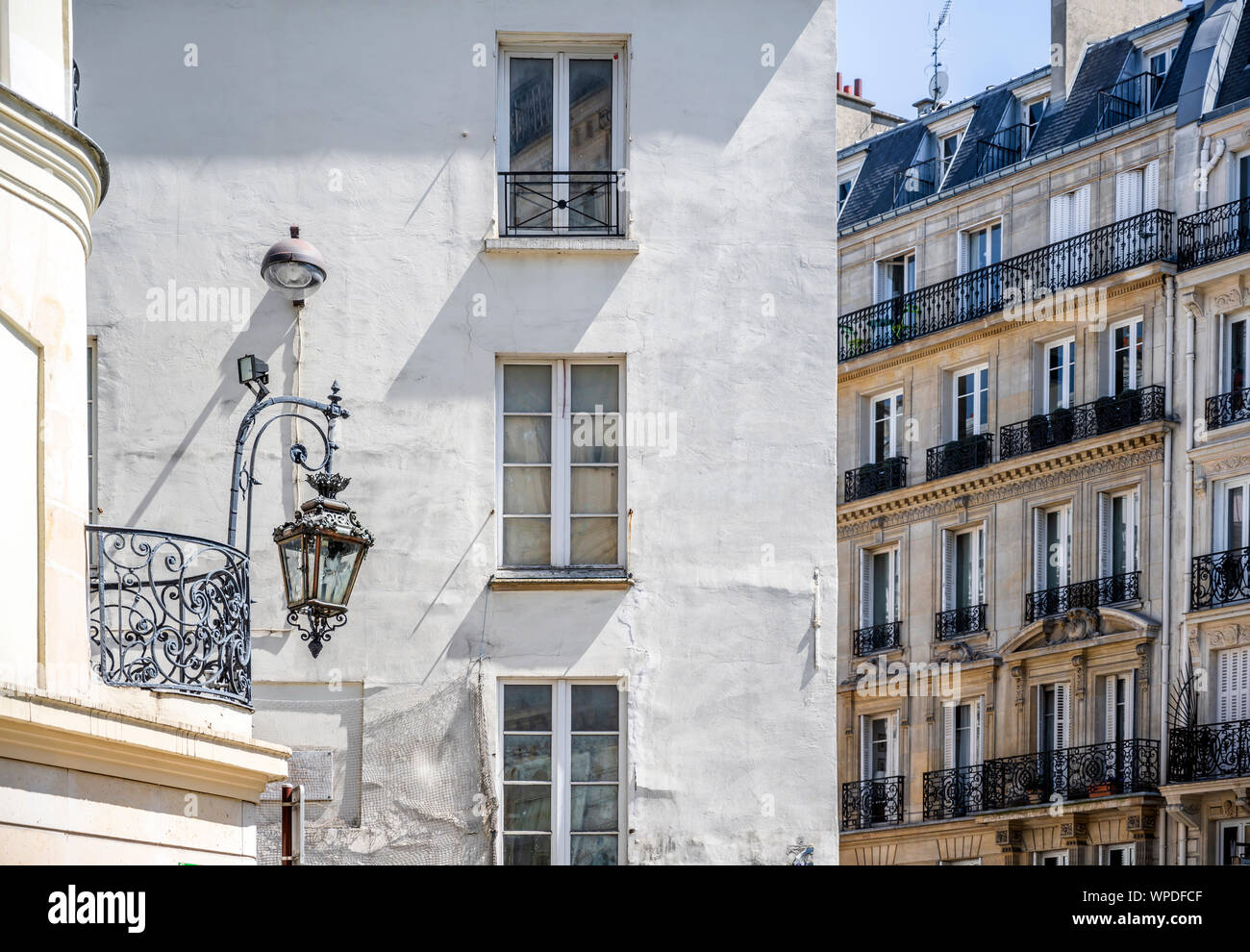 Corner of residential apartments multi-storey house with wooden ...