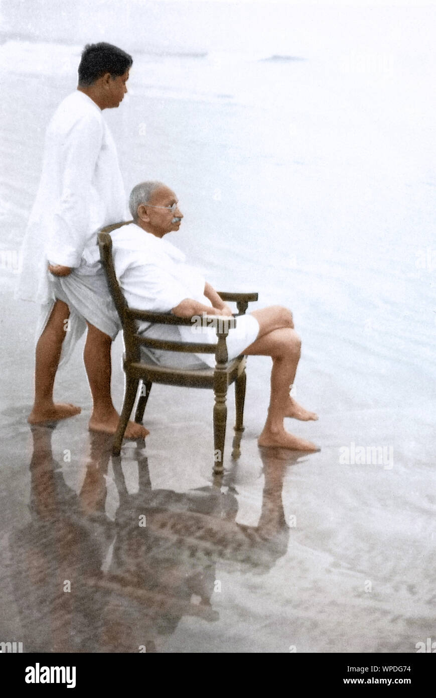 Mahatma Gandhi sitting on chair and Devdas Gandhi, Juhu Beach, Bombay ...