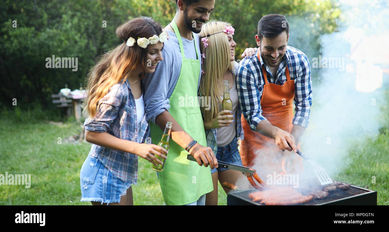 Backyard men friends barbecue hi-res stock photography and images - Alamy