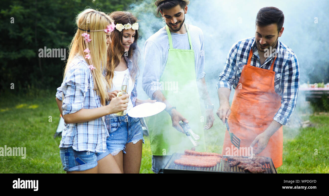 Group young people friends barbecue hi-res stock photography and images ...