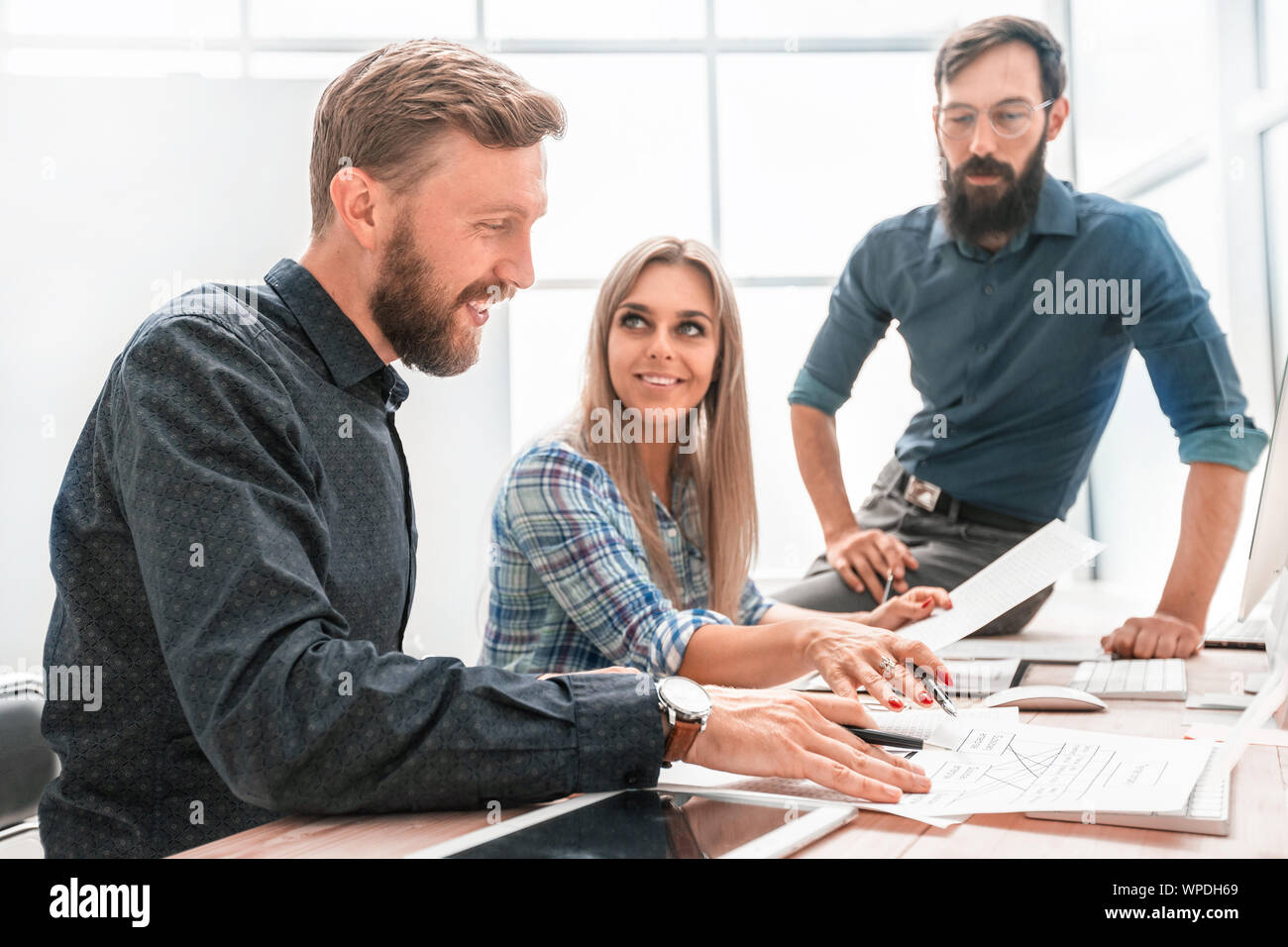 professional staff checking the financial report in the office Stock ...