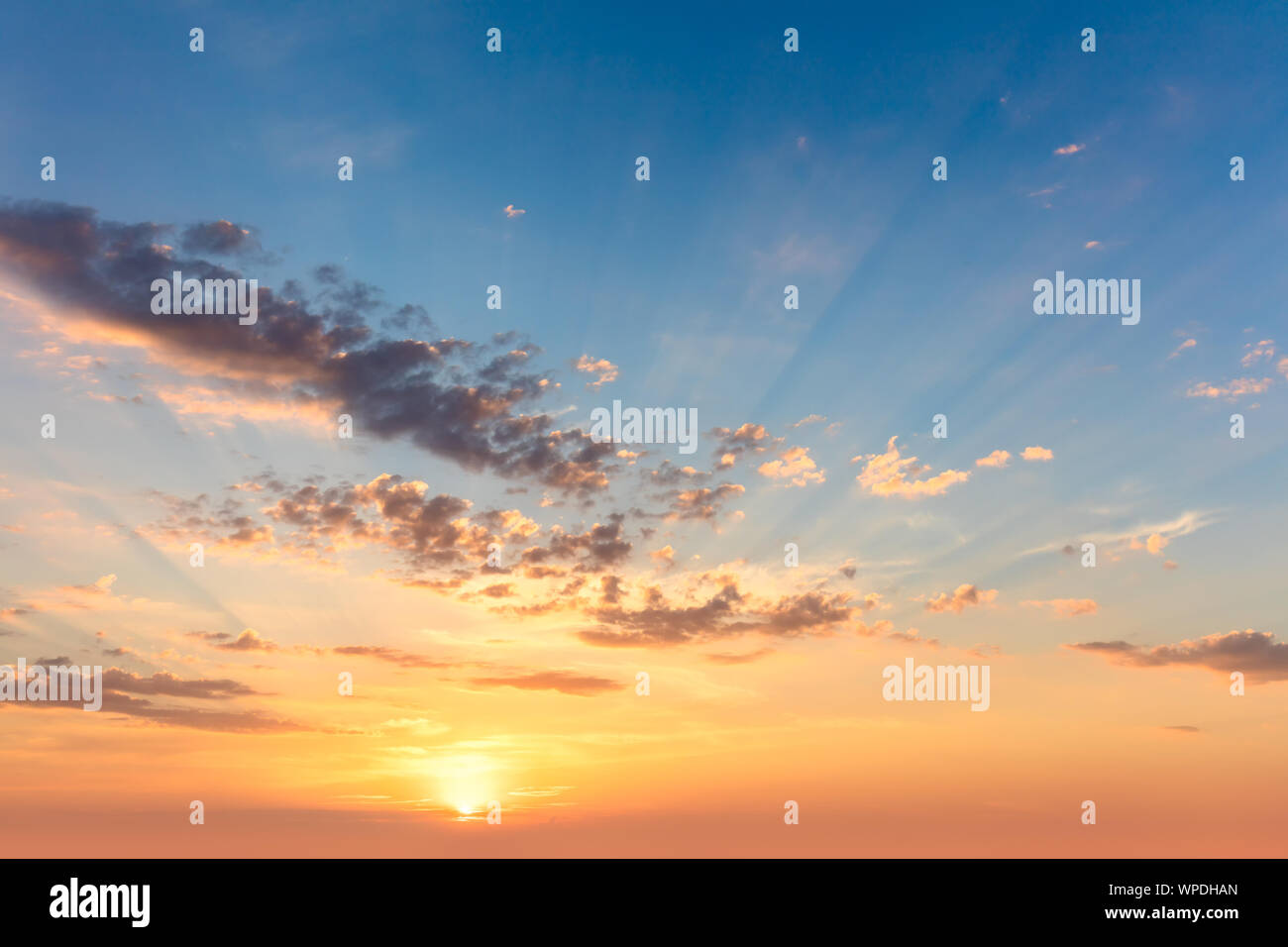Sunrise sundown sky with soft clouds and sunbeams, sky wallpaper Stock ...