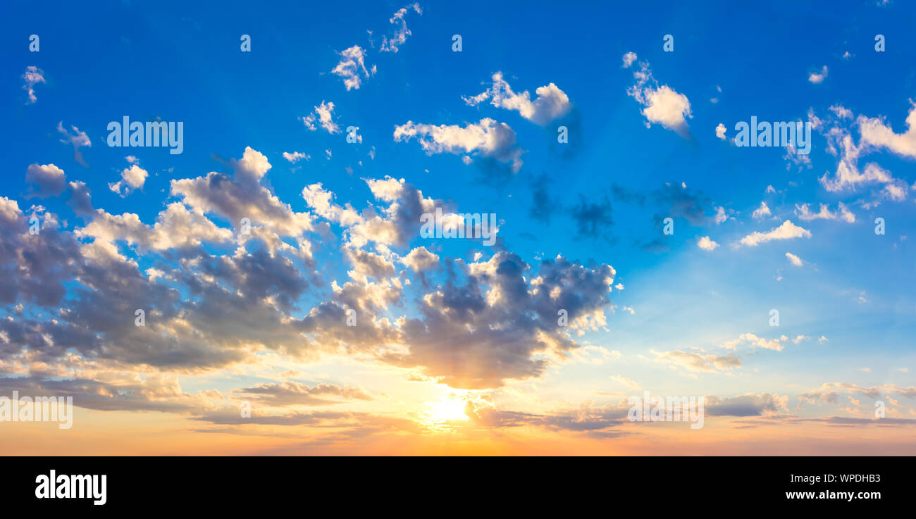 Real majestic sunrise sundown sky with sun, sun rays and colorful ...