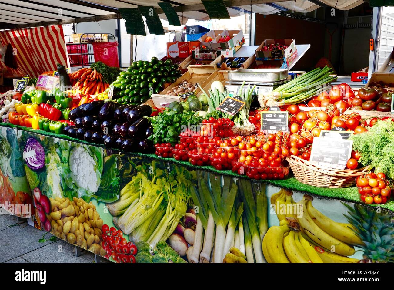 Tomatoes, eggplant, bell peppers and other fresh vegetable produce for ...