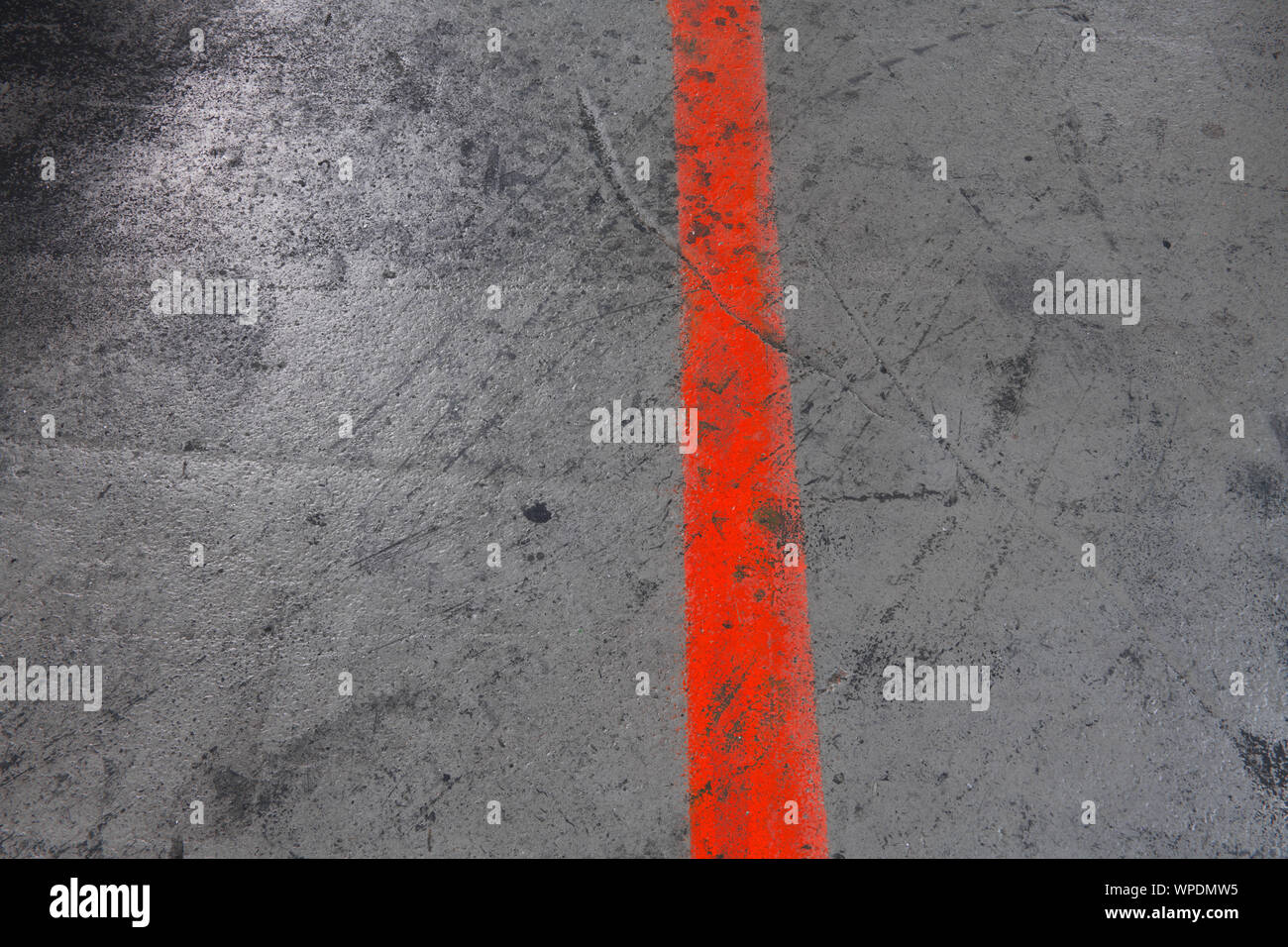 Red Line on scratched cement floor Stock Photo - Alamy