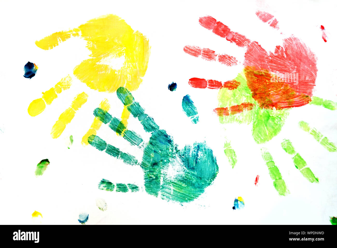 colorful hand prints isolated on white background. Yellow, green and ...