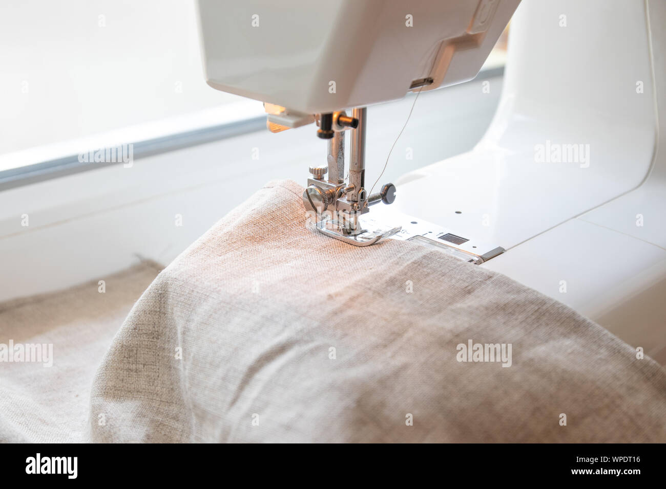 Closeup the sewing machine and item of clothing, sewing machine Stock ...