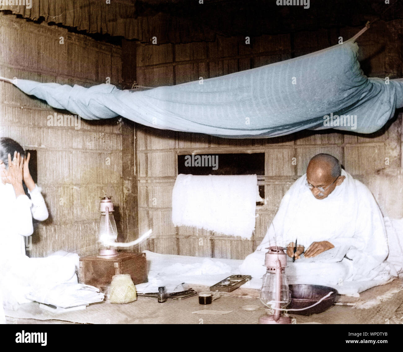 Mahatma Gandhi sitting writing in his hut, Assam, India, Asia, December ...