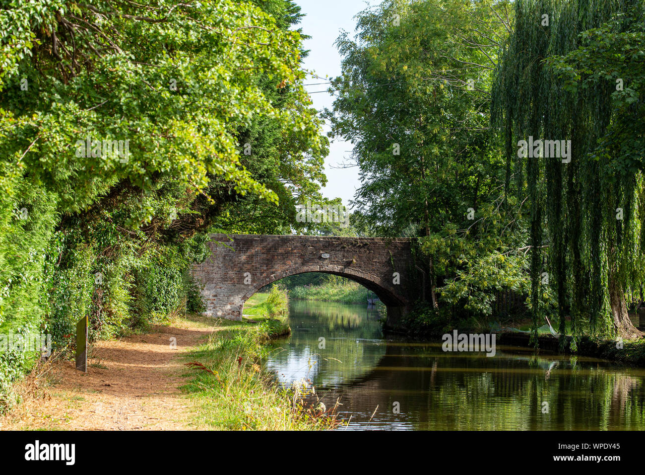 Arch bridge over Trent and Mersey canal in Cheshire UK Stock Photo - Alamy