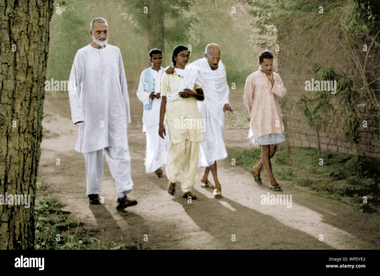 Mahatma Gandhi walking with Manu Gandhi, Abdul Ghaffar Khan, Bihar, India, Asia, March 1947 ...
